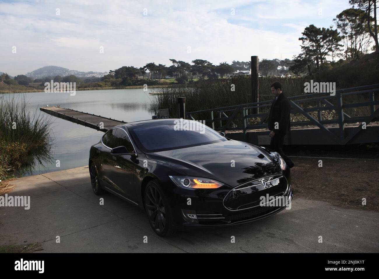 Eco entrepreneur Kristofor Lofgren shows his Tesla Model S at the boat ...