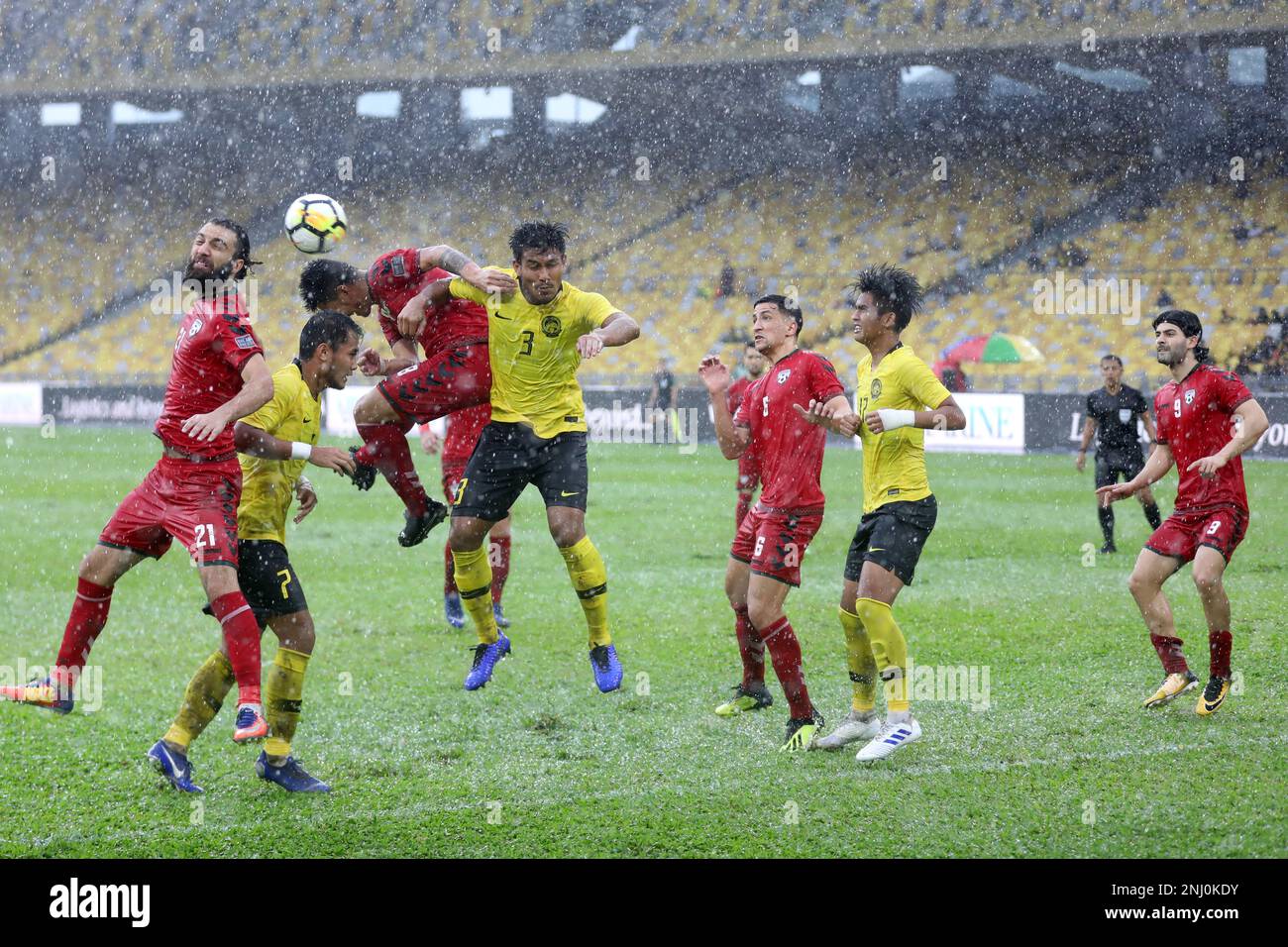 Afghanistan and Malaysia players in action during a friendly match ...