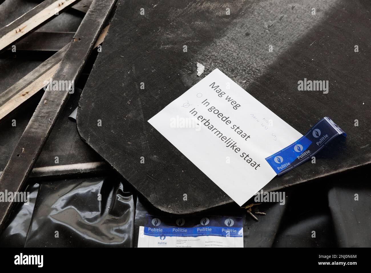 Confiscated goods and motors of boats pictured at a press conference ...
