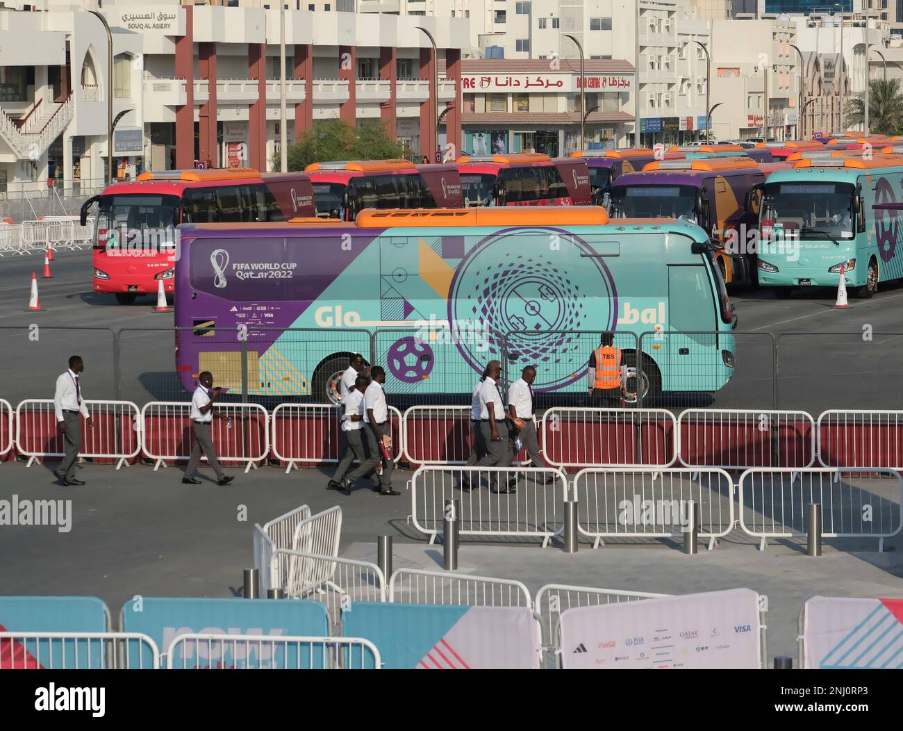 Buses park at a temporary bus stop for FIFA World Cup Qatar in Doha on ...