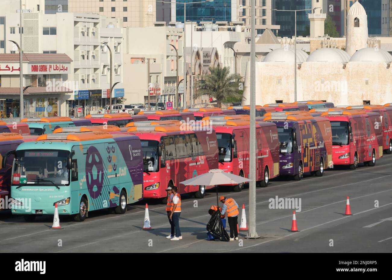 Buses park at a temporary bus stop for FIFA World Cup Qatar in Doha on ...