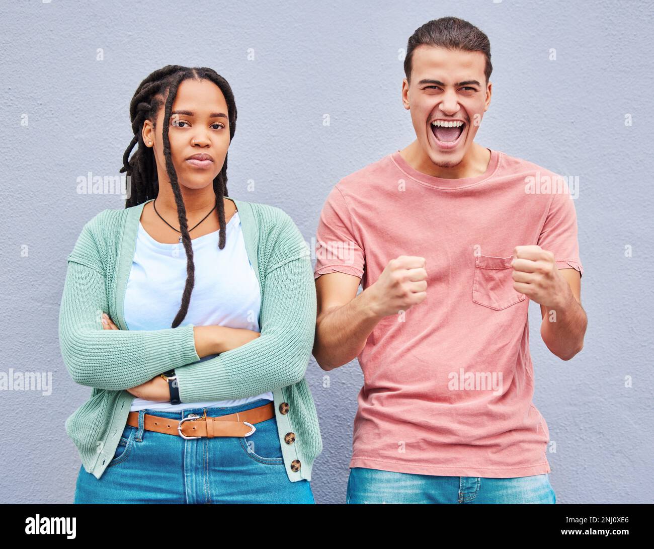 Bored, excited and portrait of an interracial couple with arms crossed, anger and happy about a ...