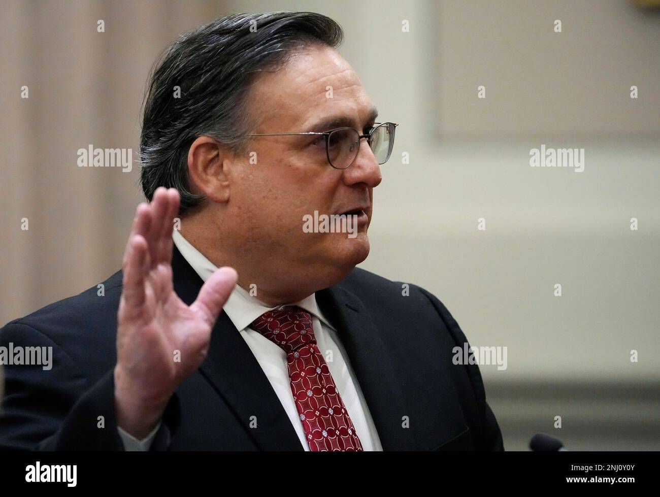 Virginia Supreme Court Justice Thomas P. Mann takes the oath as he is ...