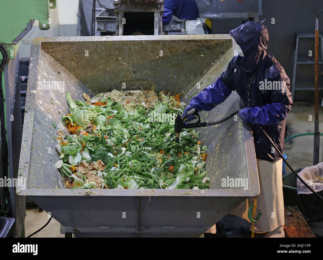 A photo shows a system for turning wasted foods into fertilizer in ...