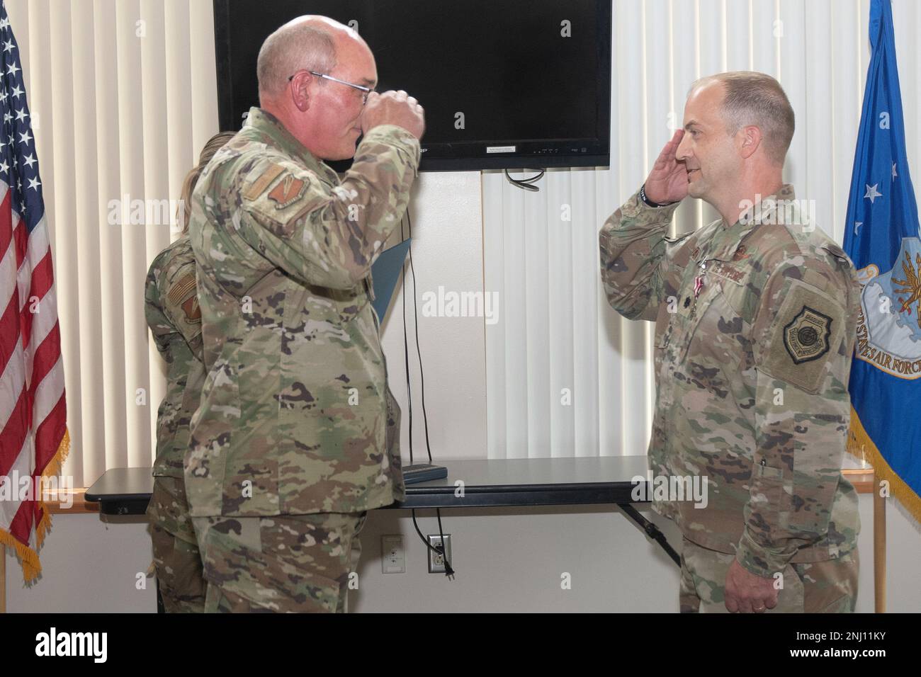 131st Force Support Services Commander Lt. Col. Timothy Sullivan, right ...
