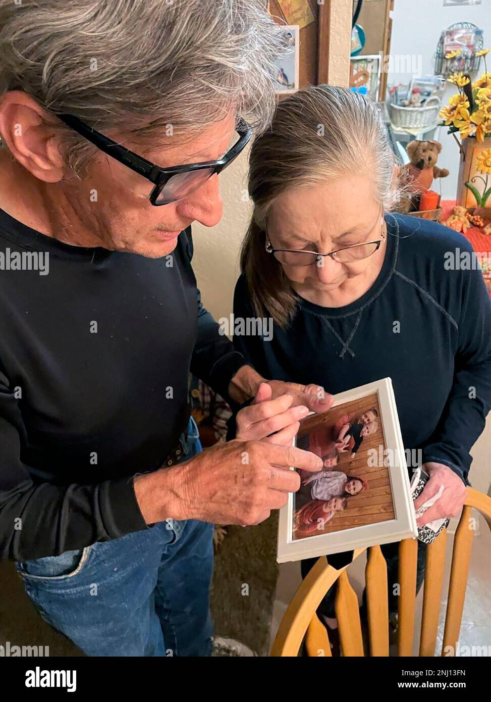 Danny Nelson and his wife Marilyn Nelson identify the five oldest of ...
