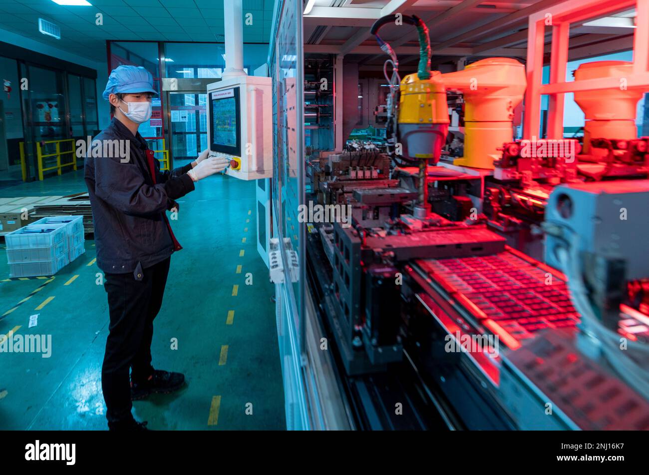YANGZHONG, CHINA - FEBRUARY 20, 2023 - Industrial robots and ...