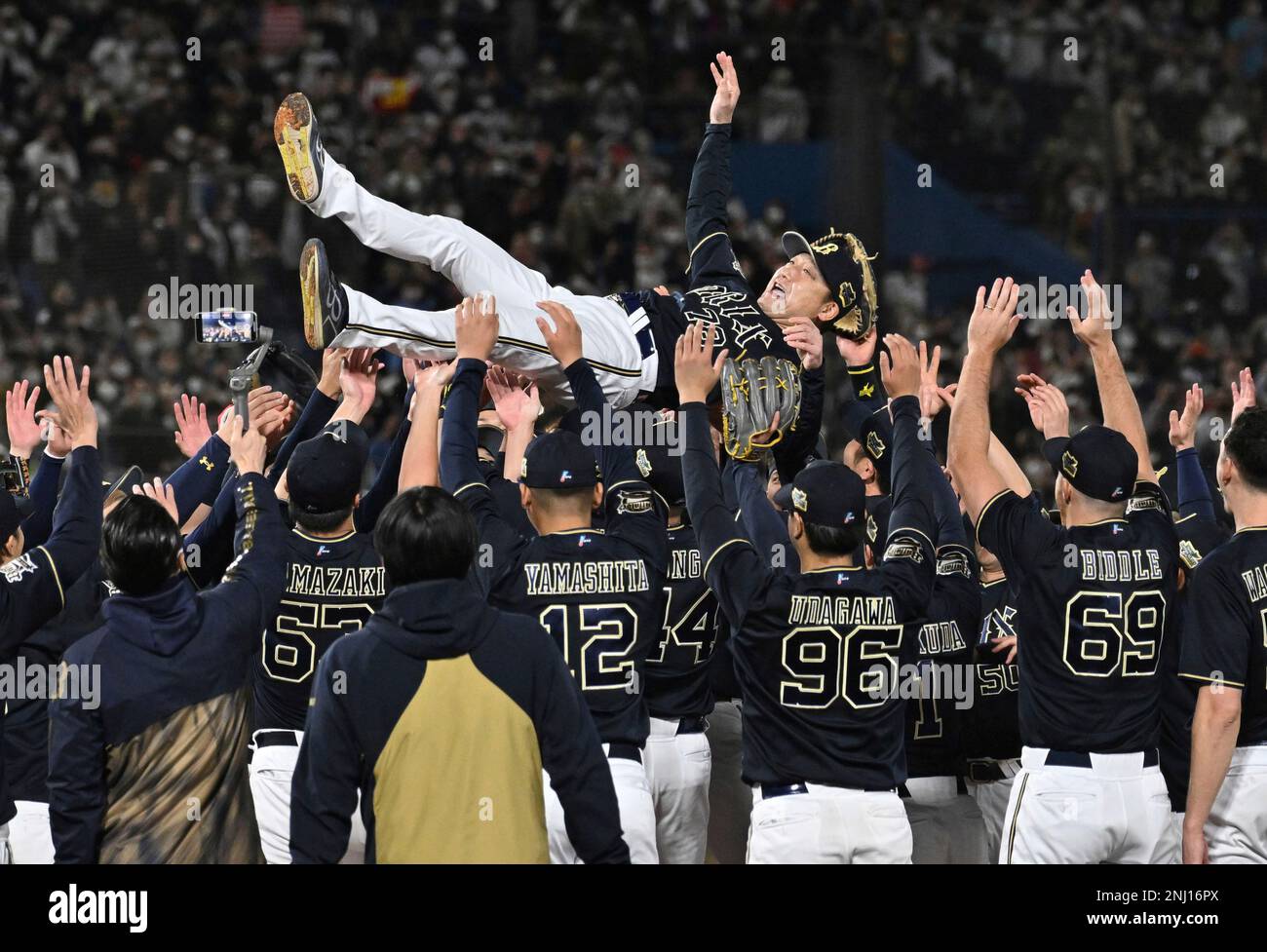 ORIX Buffaloes manager Satoshi Nakajima is tossed in the air after winning 2022 Japan Series of ...