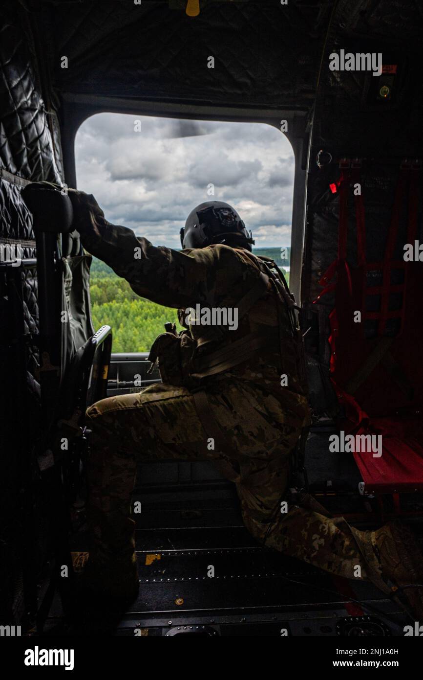 U.S. Army Staff Sgt. Patrick Smith, a flight engineer assigned to the ...