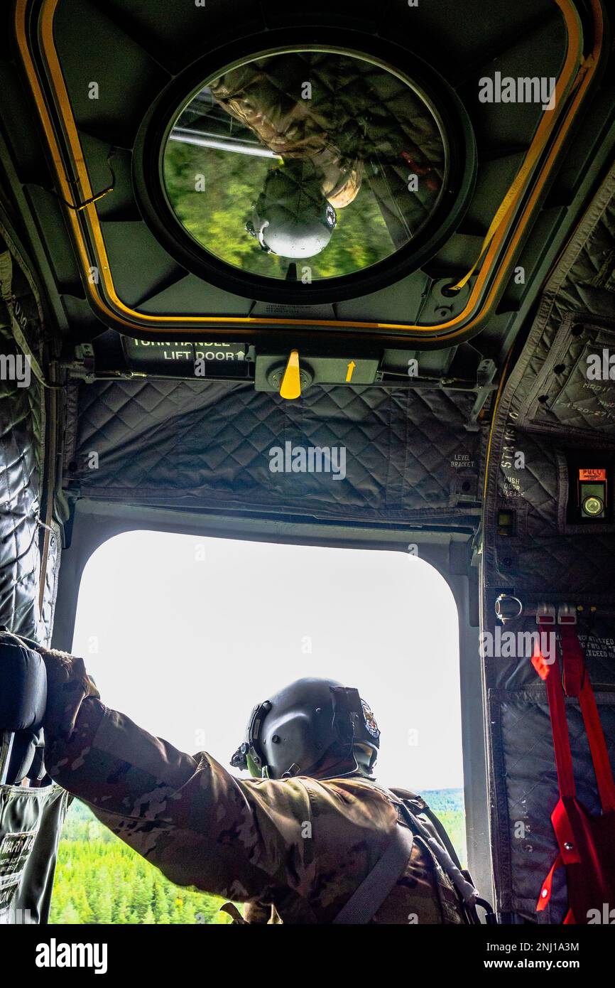 U.S. Army Staff Sgt. Patrick Smith, a flight engineer assigned to the ...