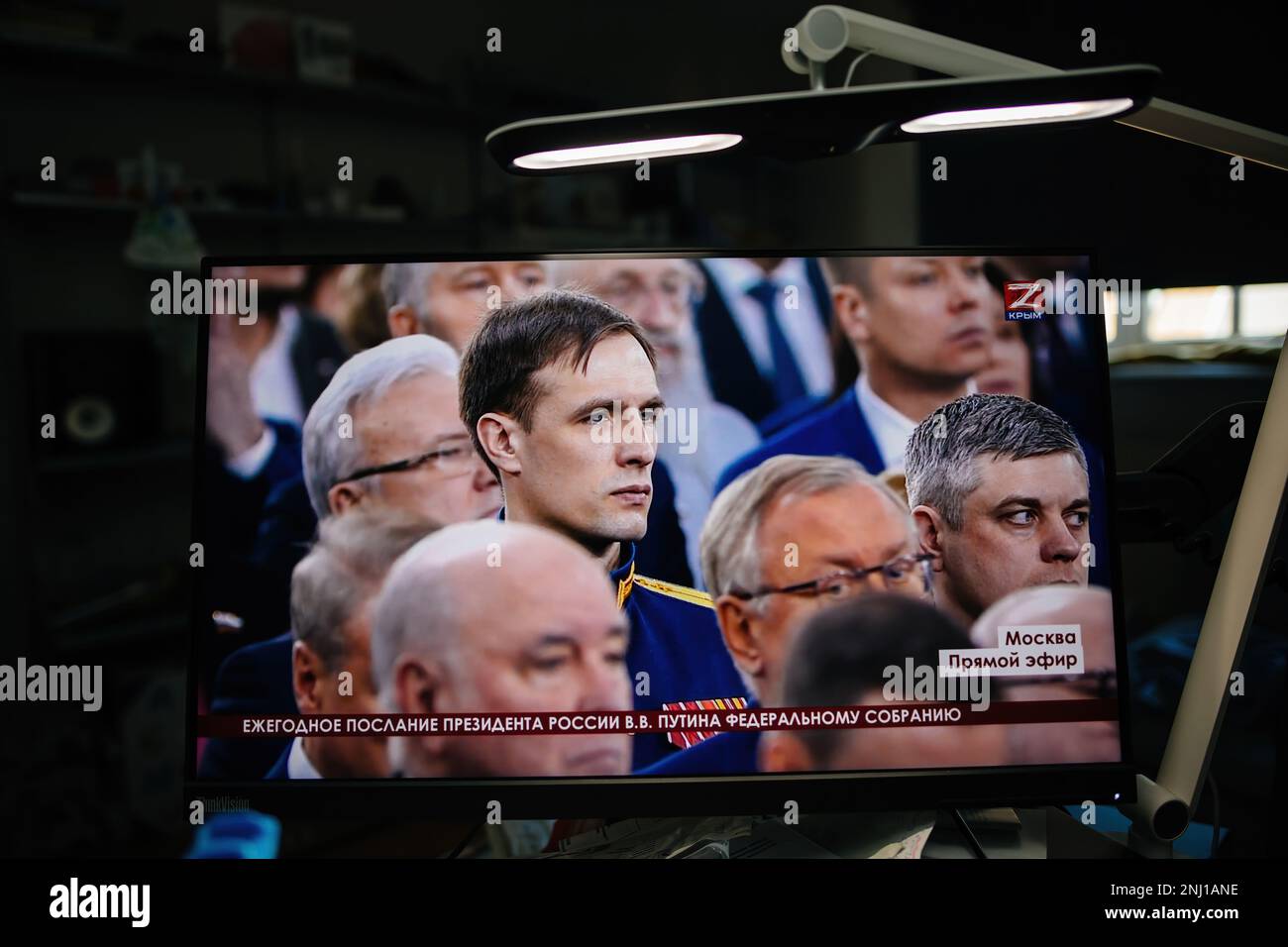 Paris, France - Feb 21, 2023: Office desk with display running Krym 24 ...