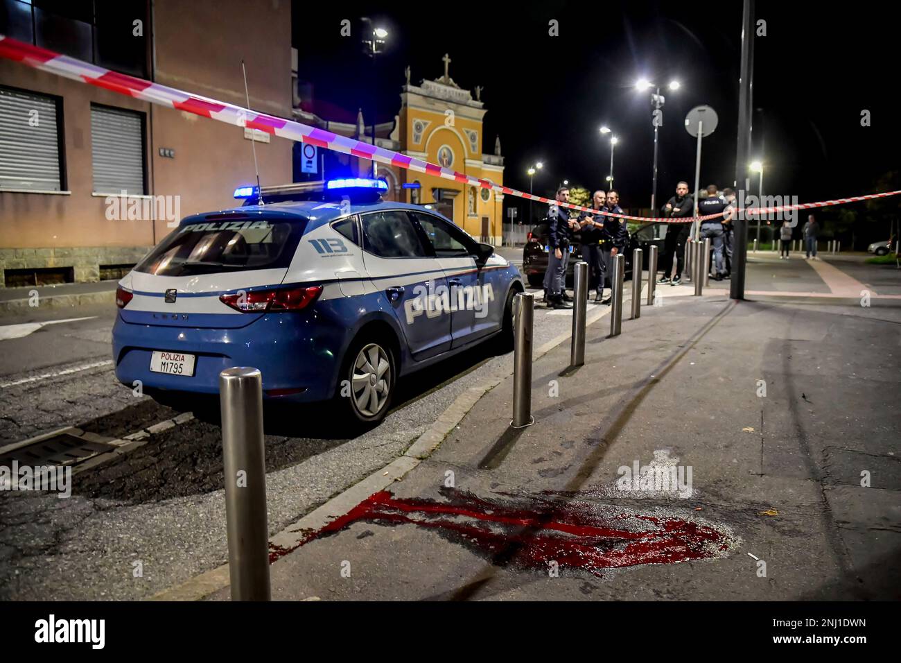 Blood stains a street in Milan, Italy near scene where Vittorio ...