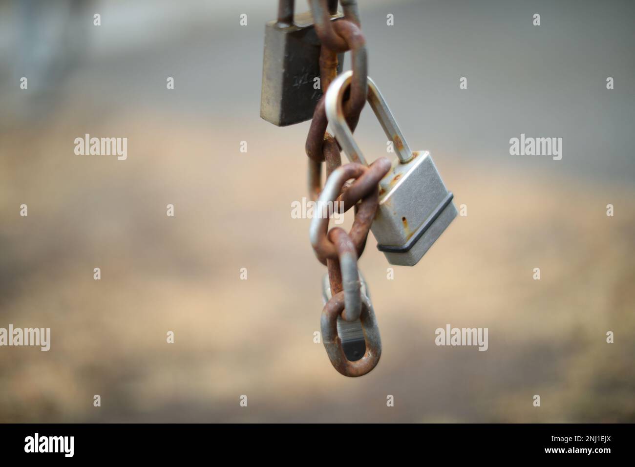 lock on door and chain giving protection with metal padlock Stock Photo ...