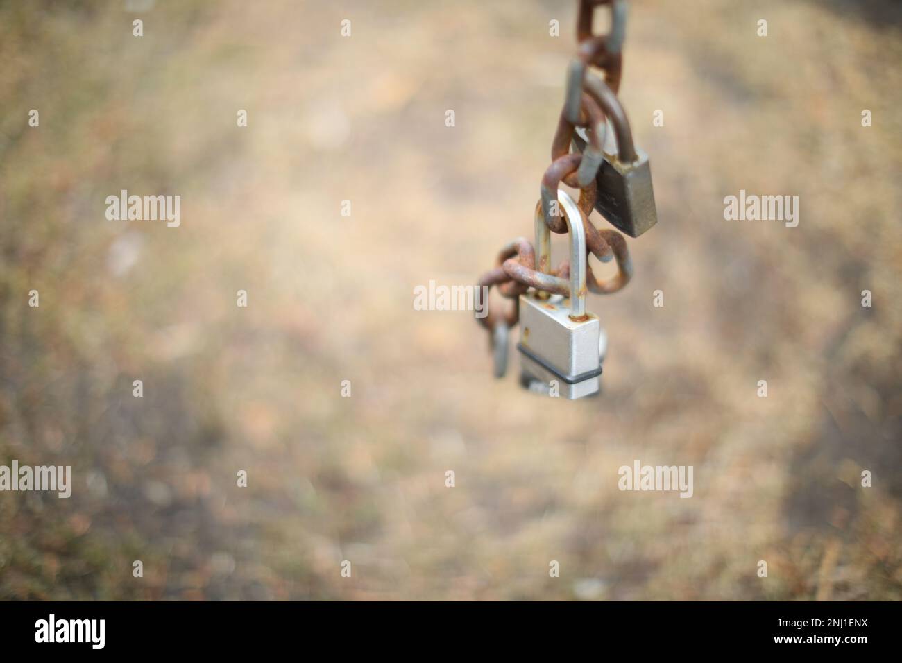 lock on door and chain giving protection with metal padlock Stock Photo ...
