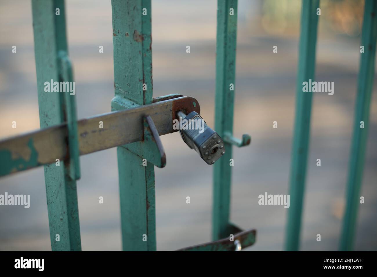 lock on door and chain giving protection with metal padlock Stock Photo ...