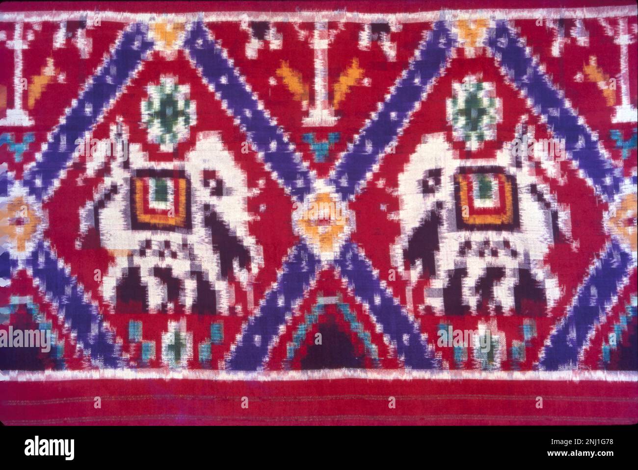 Patola is a double ikat woven sari, usually made from silk, made in ...