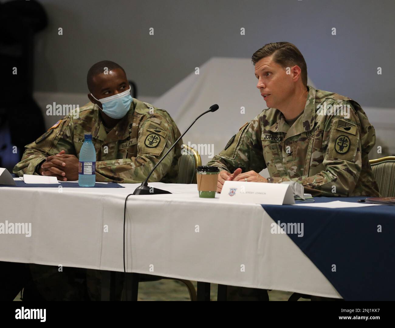 Dr. (Col.) Jeremy Johnson, right, commander of U.S. Army Medical ...