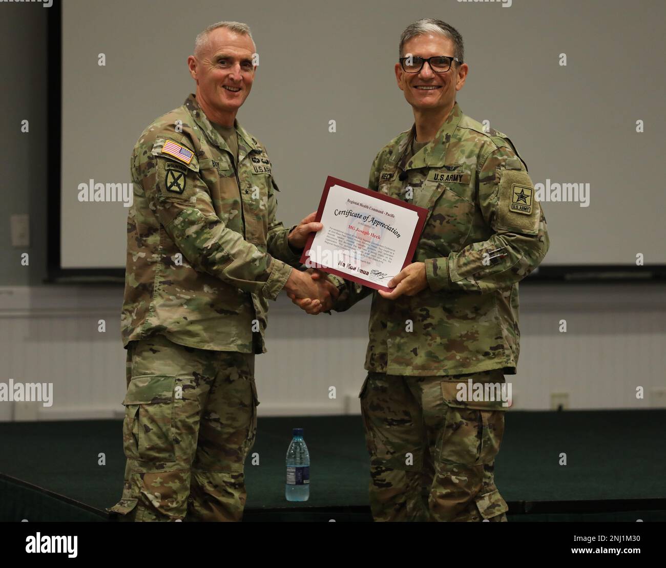 Brig. Gen. Edward H. Bailey, left, commanding general of Regional ...