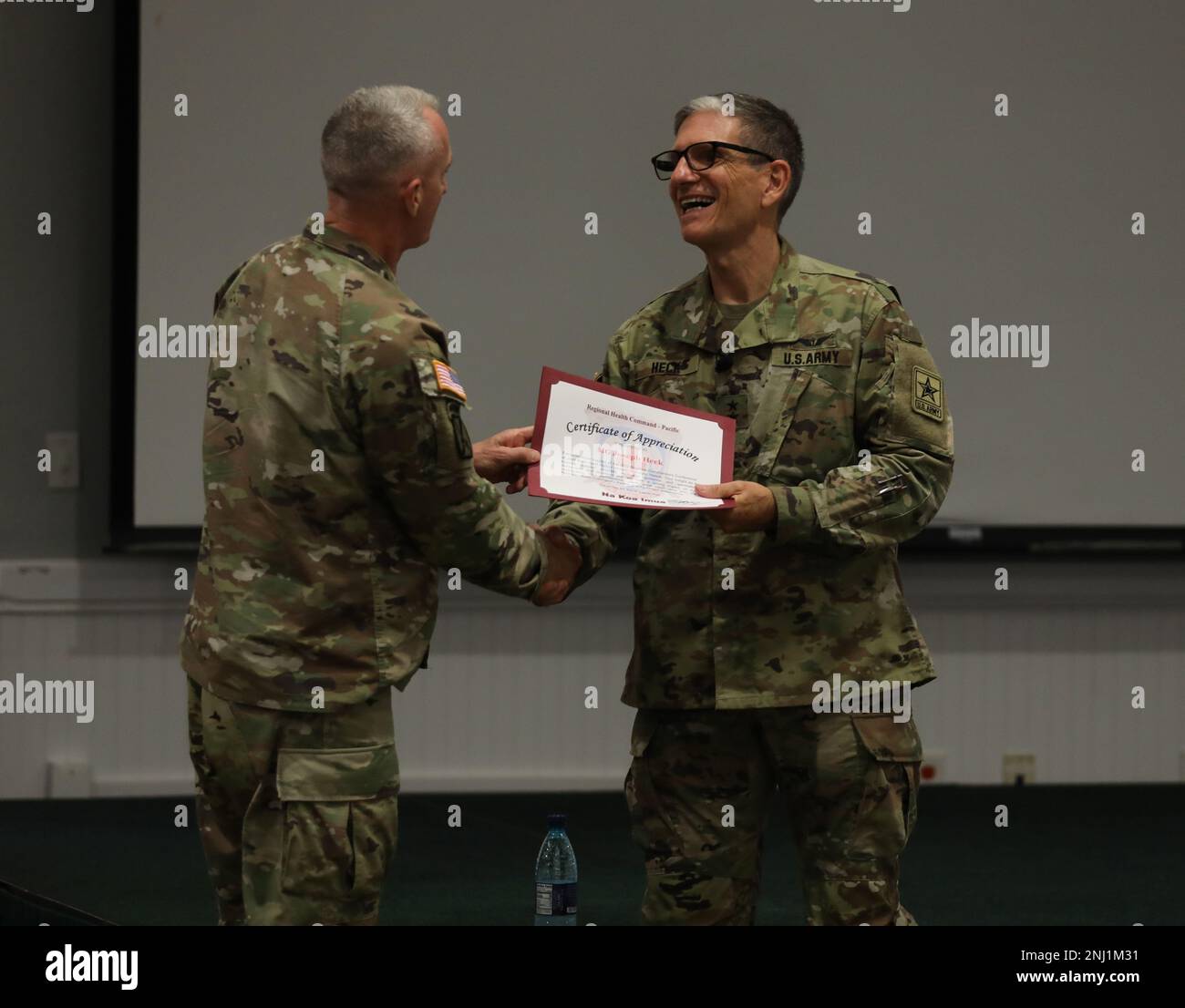 Brig. Gen. Edward H. Bailey, left, commanding general of Regional ...