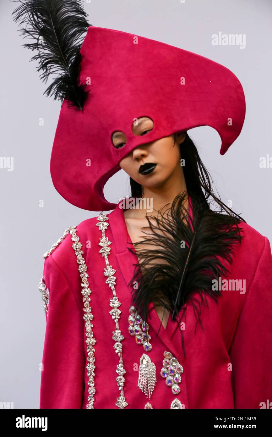 A model wearing an outfit made by Buerlangma at the London Fashion Week ...