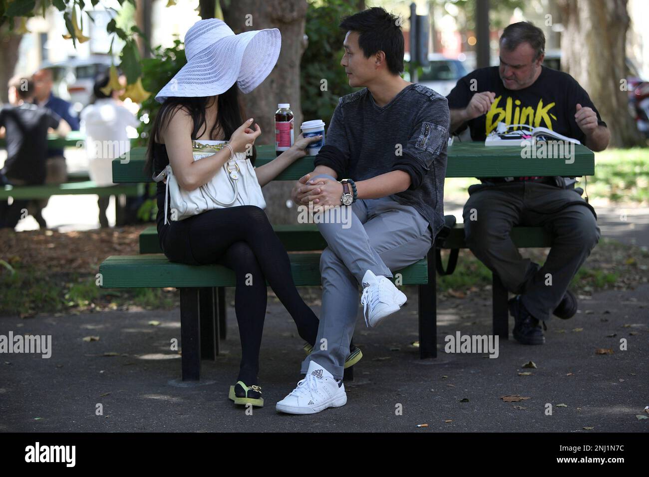 Boya Hu (left) talking with Ding Zhou (right), both from San Francisco ...
