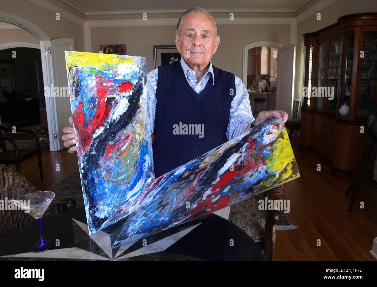 American entrepreneur and inventor Maurice Kanbar showing one of his ...