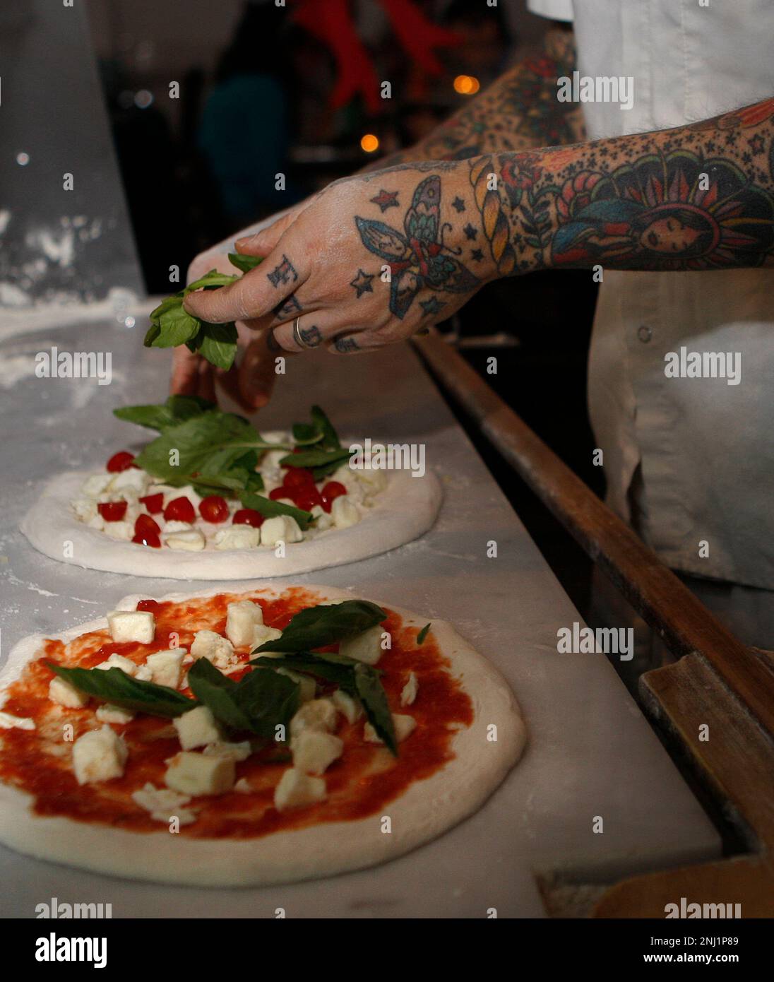 Chef Anthony Mangieri of Una Pizza Napoletana making pizzas during ...