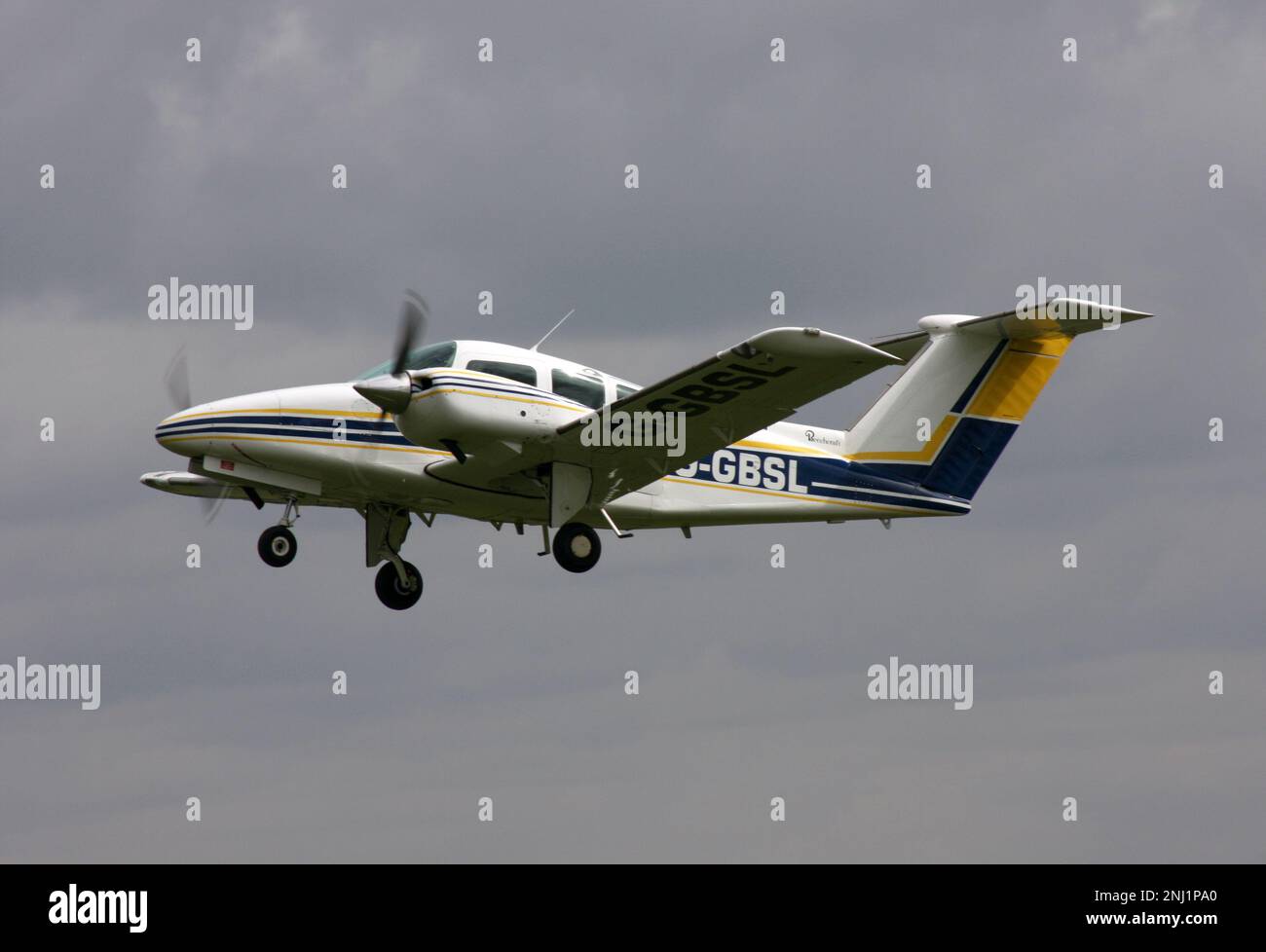 A Beechcraft 76 Duchess departs Redhill Aerodrome Surrey England Stock ...