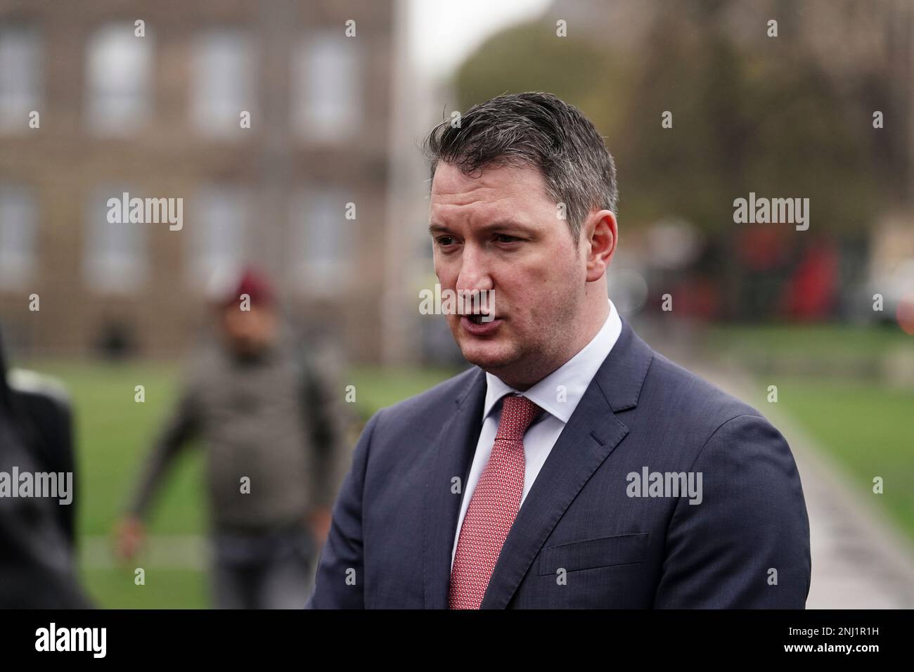 MP John Finucane speaks to the media outside the Houses of Parliament ...