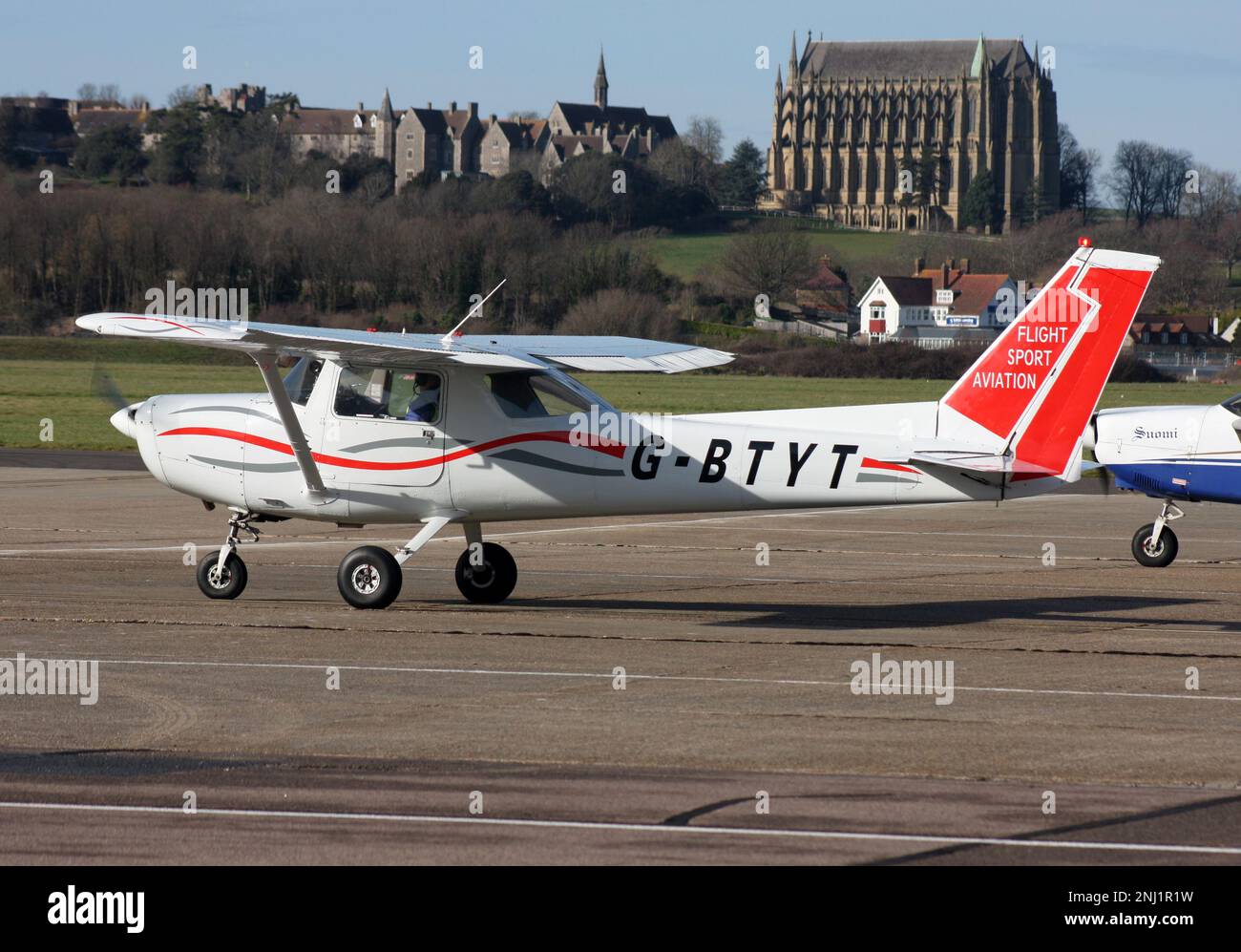 A Cessna 152 in Deanland Flight Training colours on the ramp at ...