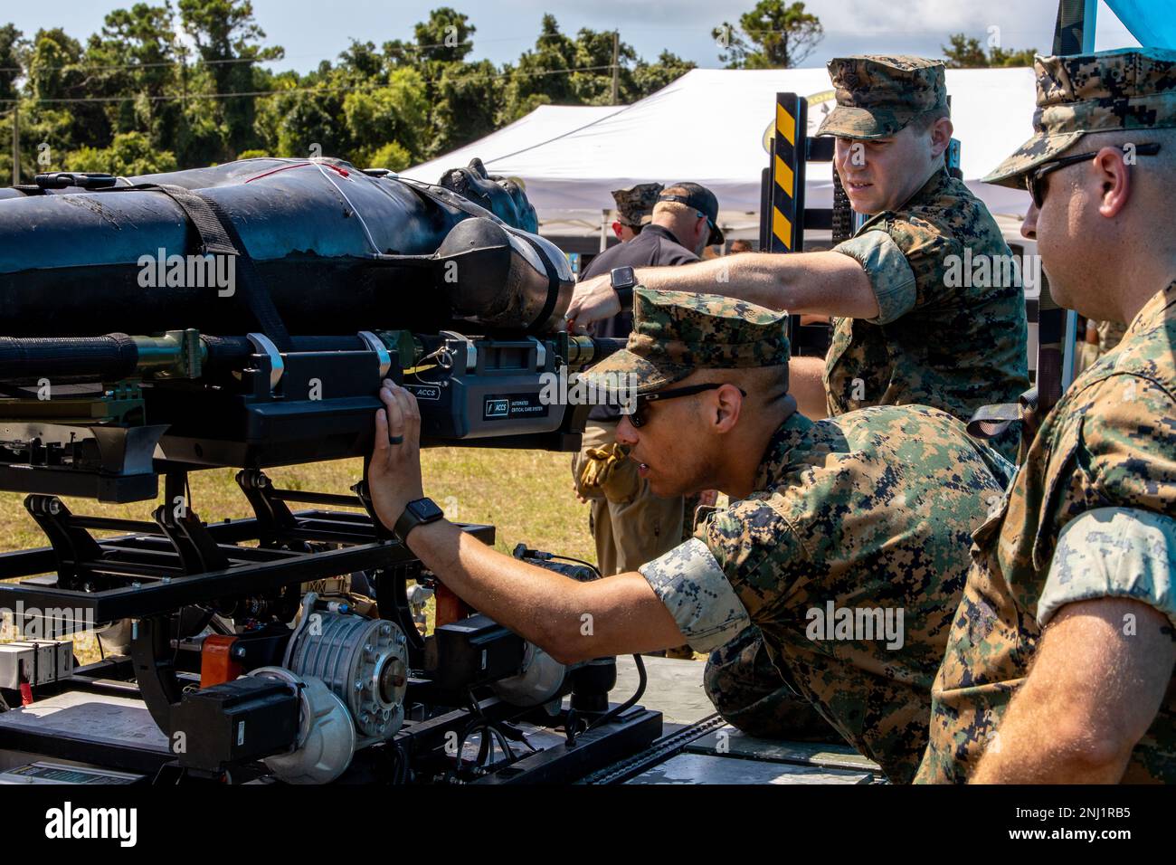 U.S. Marines and U.S. Navy Sailors assigned to II Marine Expeditionary ...