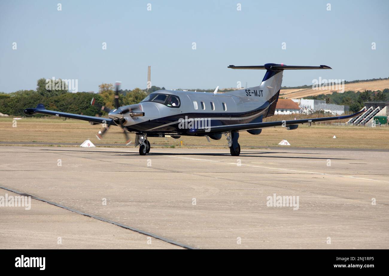 A Pilatus PC-12 single engine executive aircraft on the ramp at ...