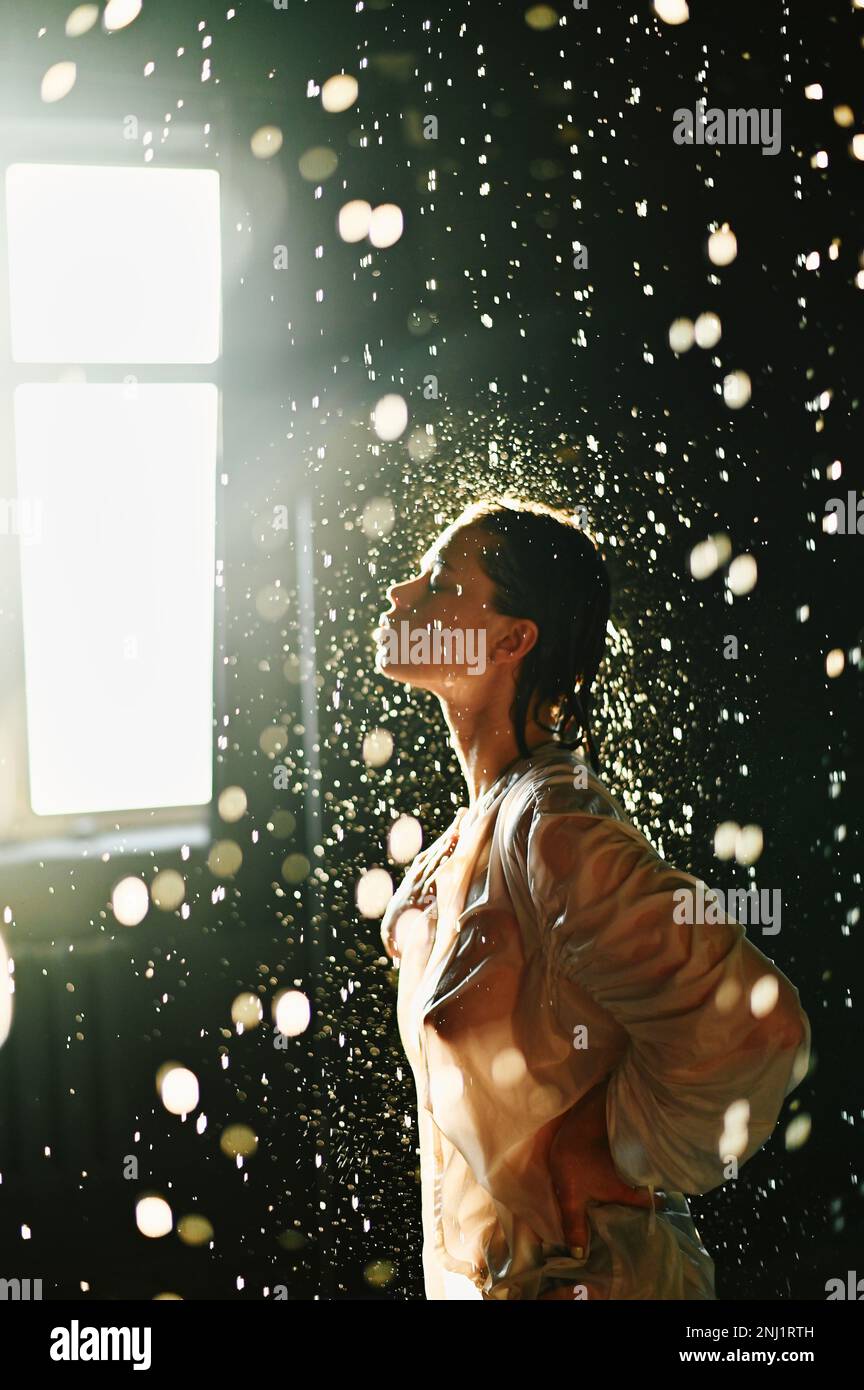 Water Splash A Girl Under The Shower Wet Clothes Young Woman