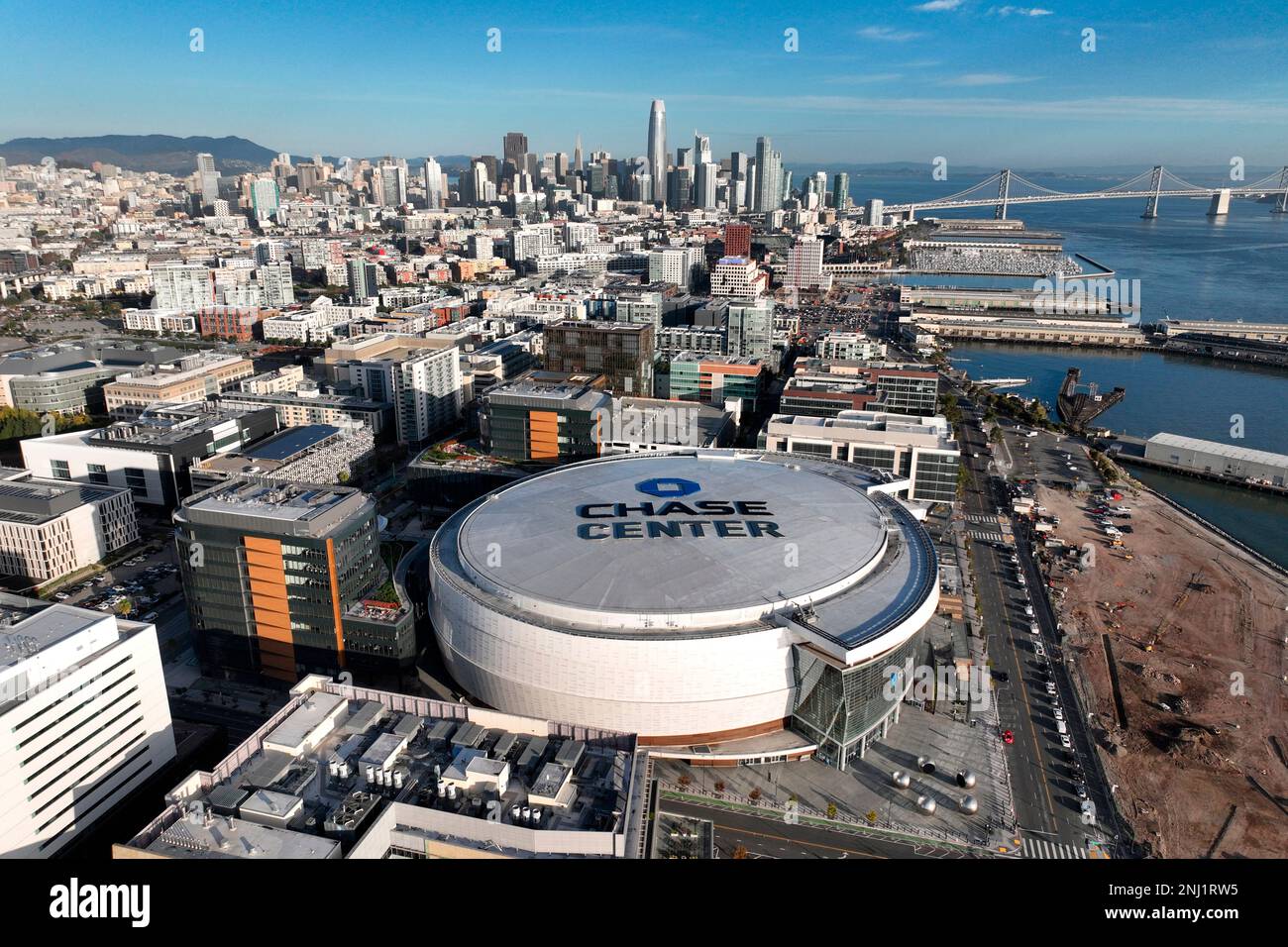 A general overall aerial view of the Chase Center with the Bay Bridge ...
