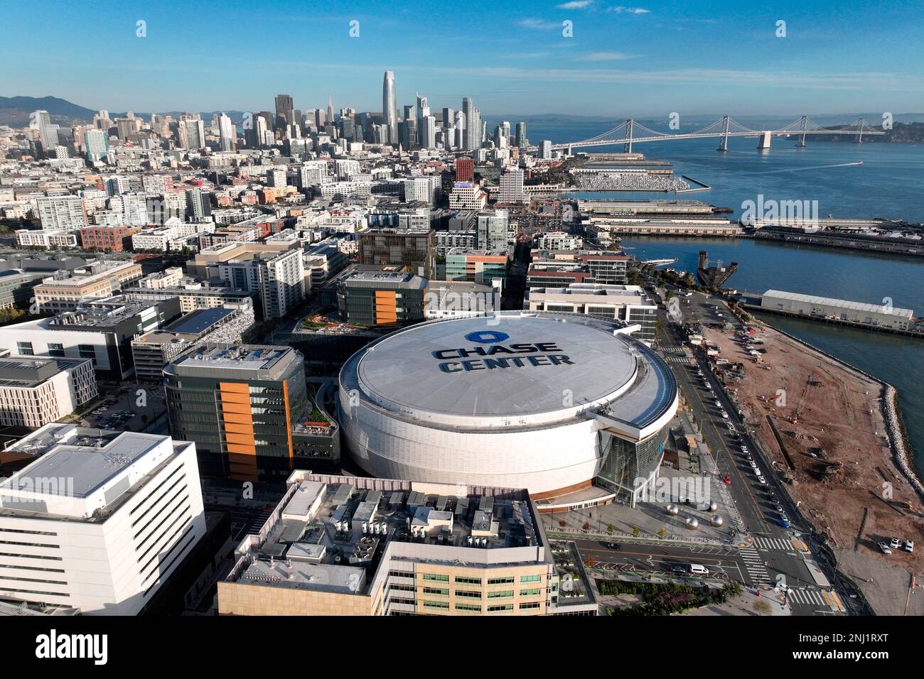 A general overall aerial view of the Chase Center with the Bay Bridge ...
