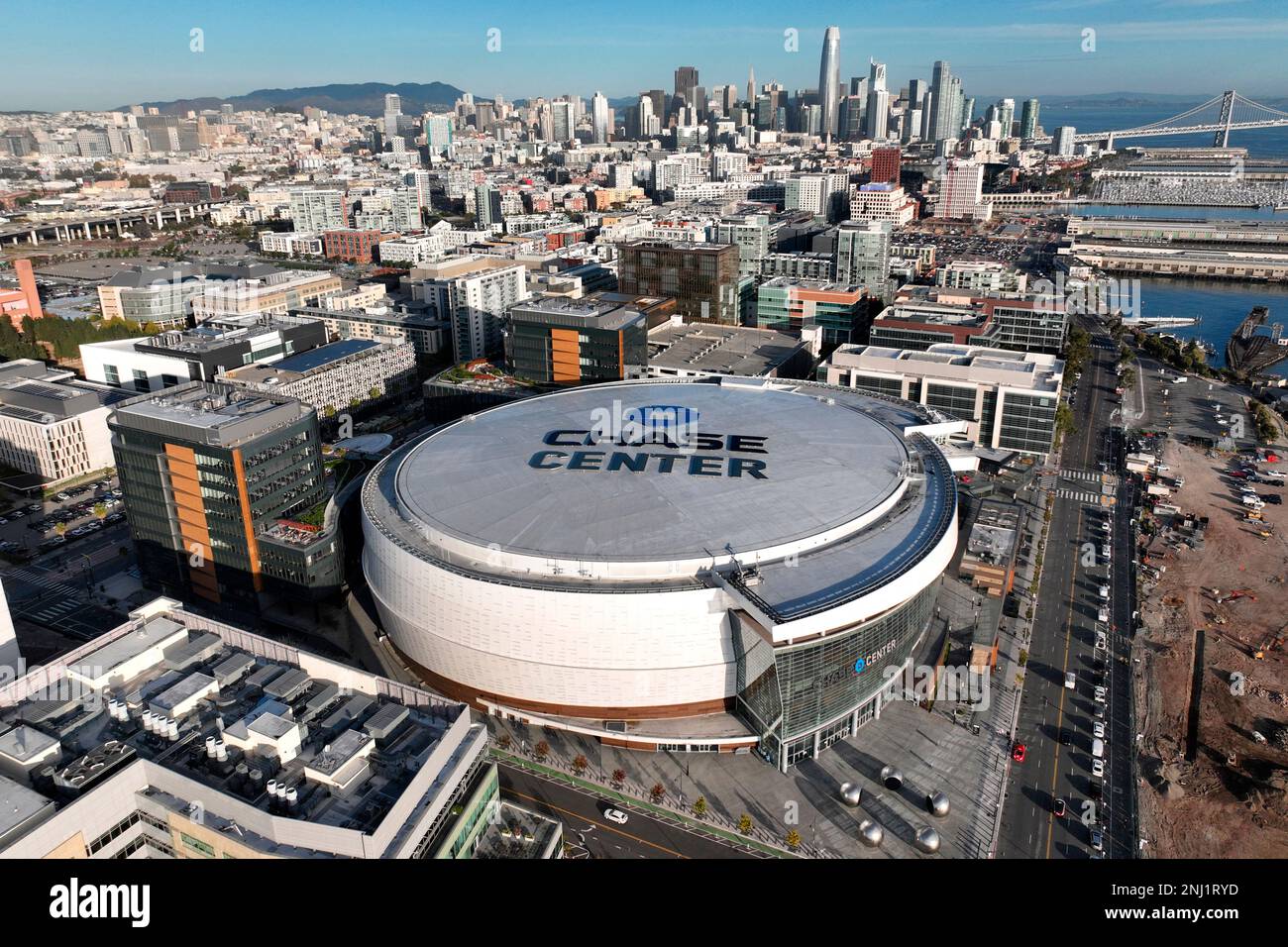 A general overall aerial view of the Chase Center with the Bay Bridge ...