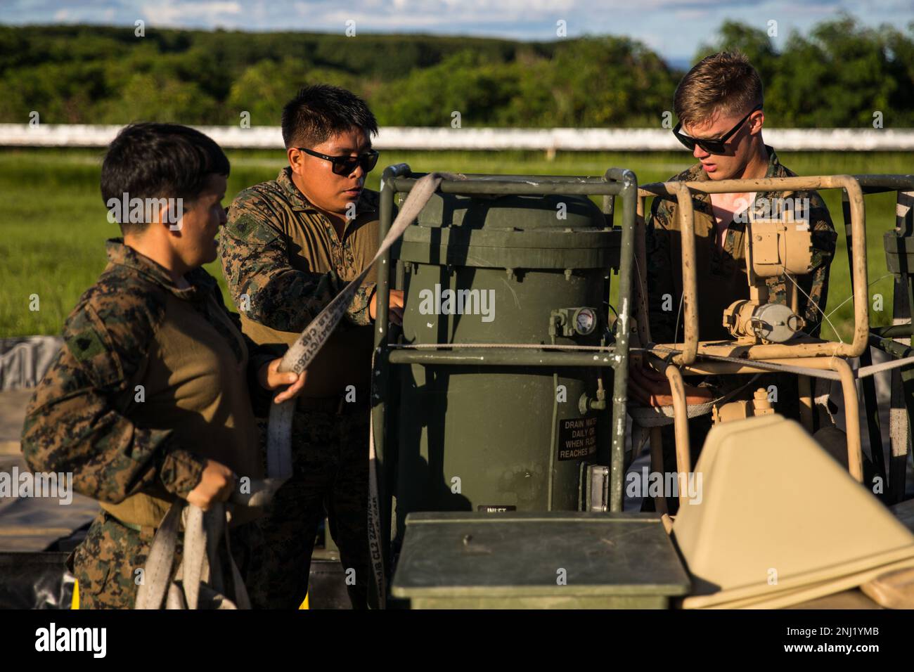 U.S. Marines with Marine Wing Support Squadron (MWSS) 171 prepare fuel ...