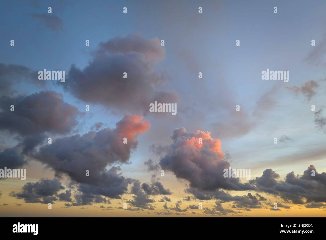 Colorful evening landscape with soft pastel coloured cloudscape on ...