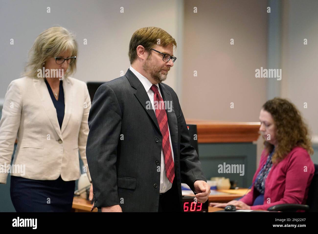 Jaye Rancourt, left, and Benjamin Falkner, center, defense attorneys ...