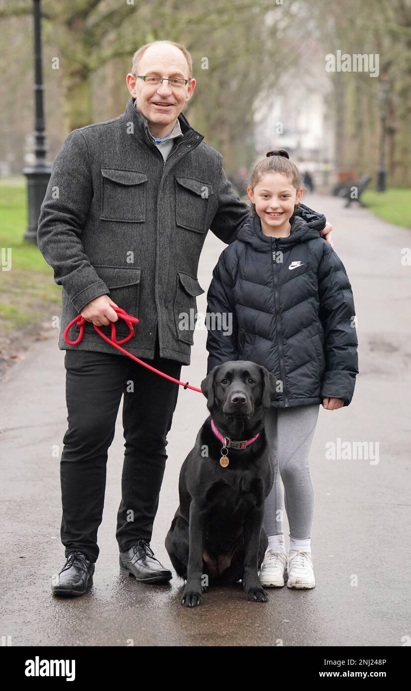 Wayne (left) and Lily Bellamy (right), 11, from Swansea, with Labrador ...