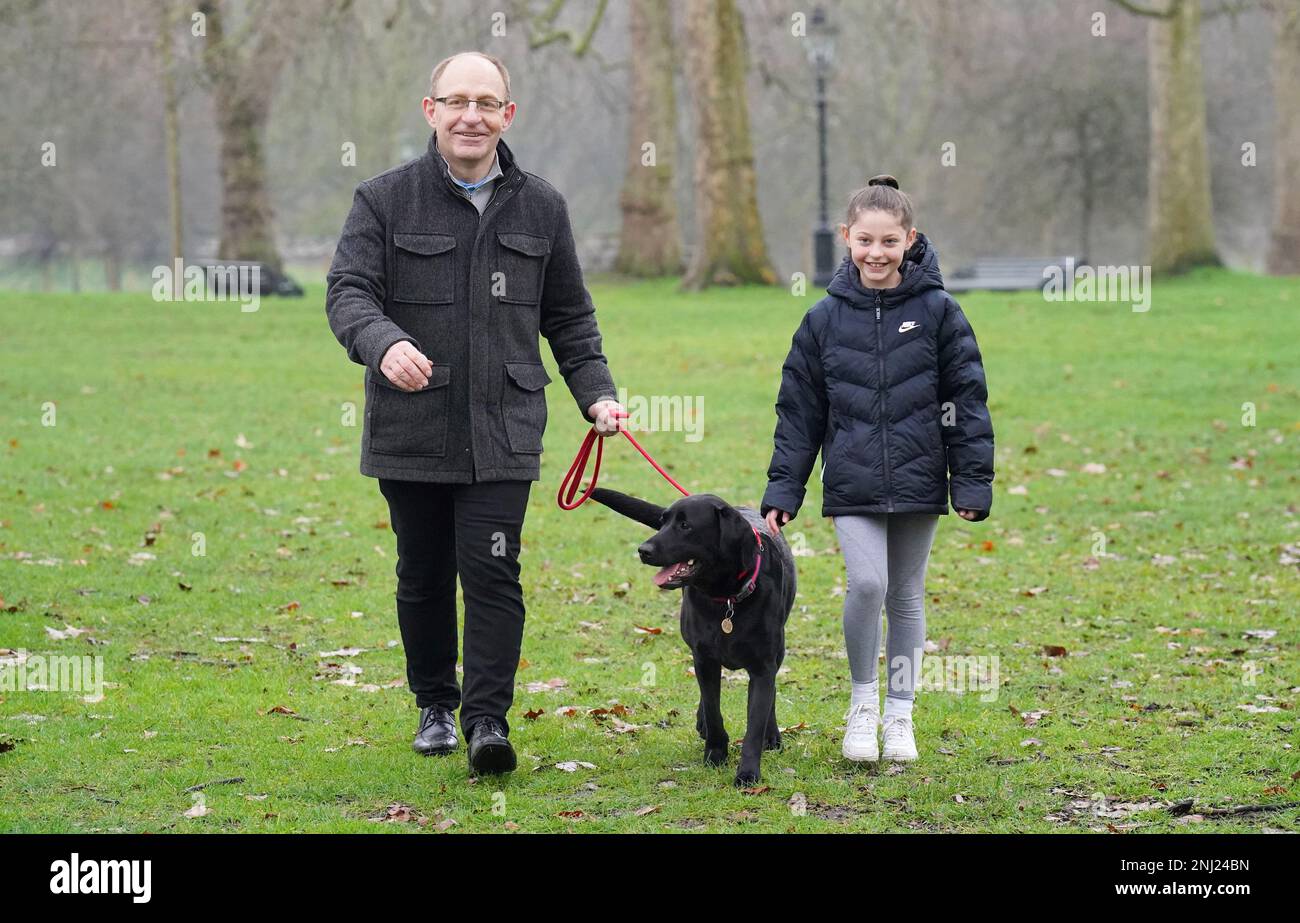 Wayne (left) and Lily Bellamy (right), 11, from Swansea, with Labrador ...