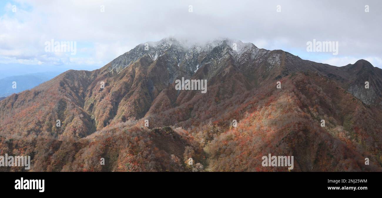 An aerial photo shows snow-capped Mount Daisen in Tottori prefecture on ...