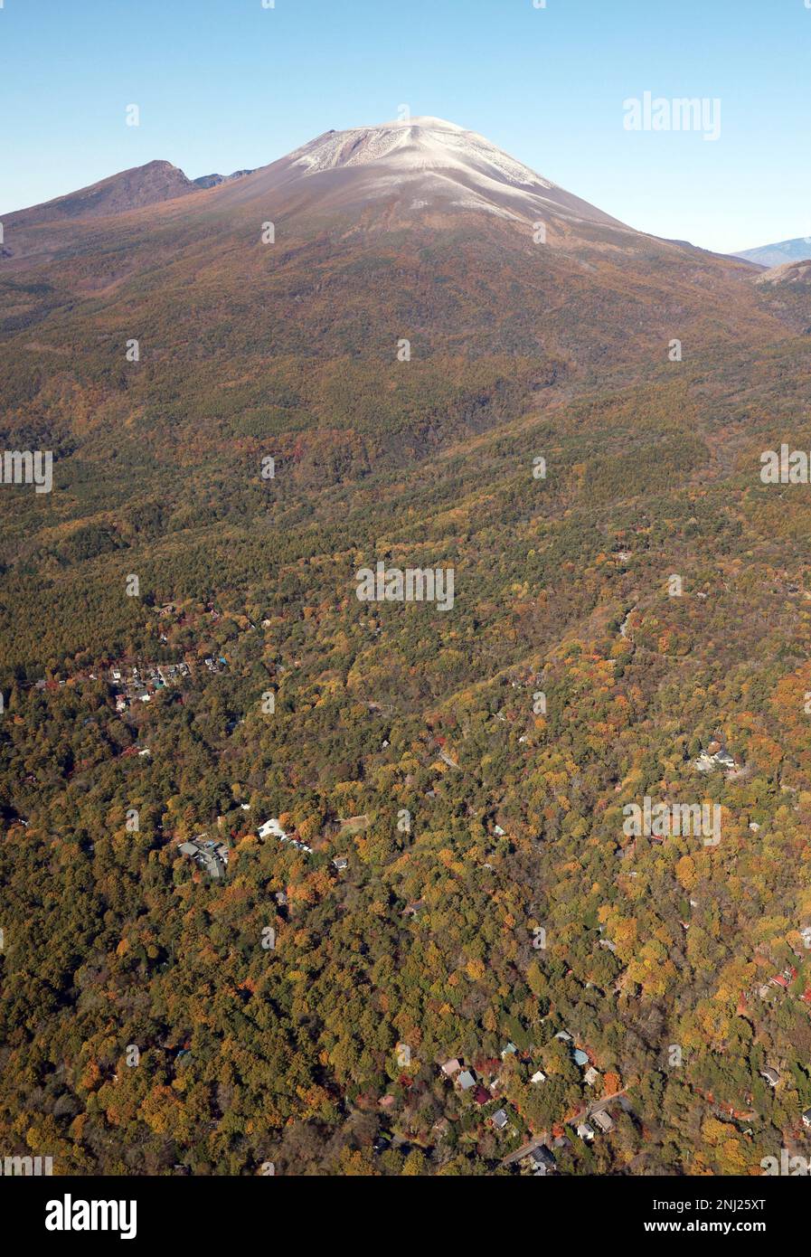 An aerial photo shows snow-capped Mount Asama in Nagano prefecture on ...