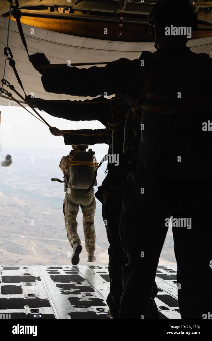 A British Royal Marine with 148 (Meiktila) Commando Forward Observation ...