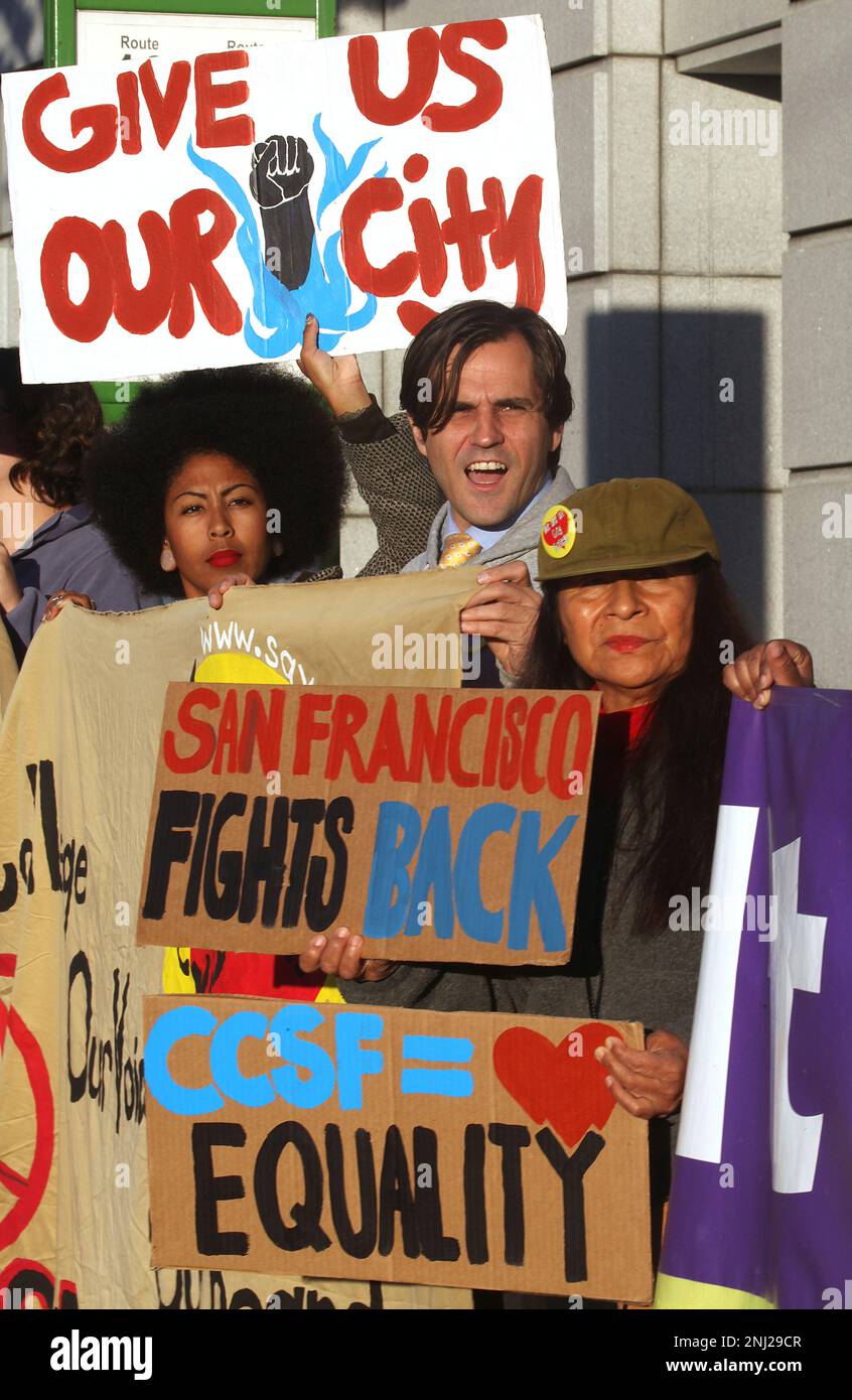 Educators and students including president of the Black Student Union Thea Matthews (left ...