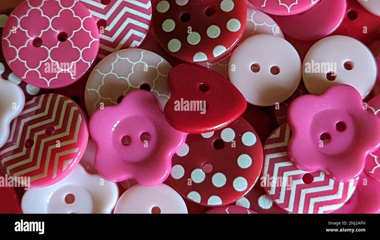 Assorted pink buttons Stock Photo - Alamy