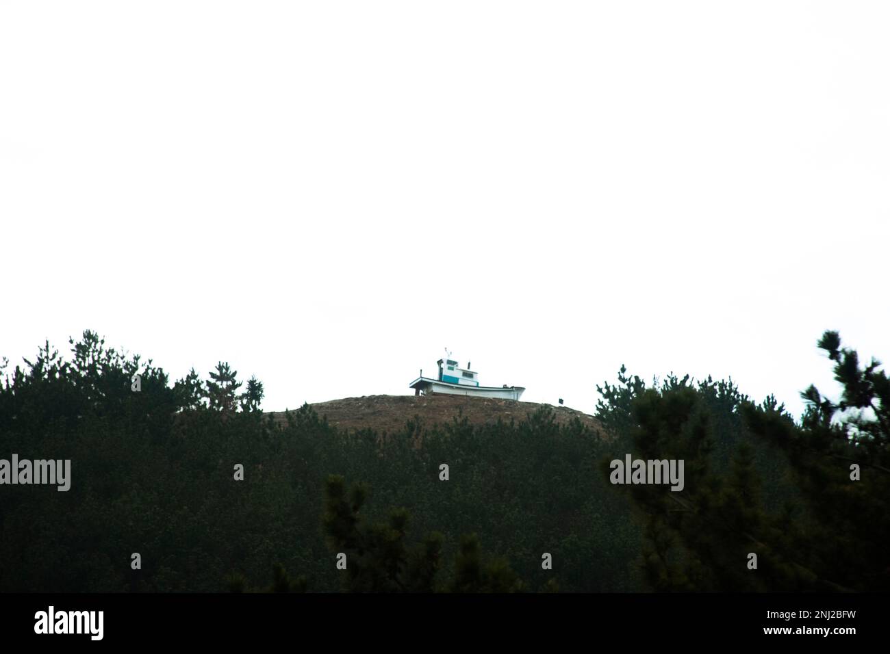 Wooden korean fishery fishing ship boat moor on top of mountain hill ...
