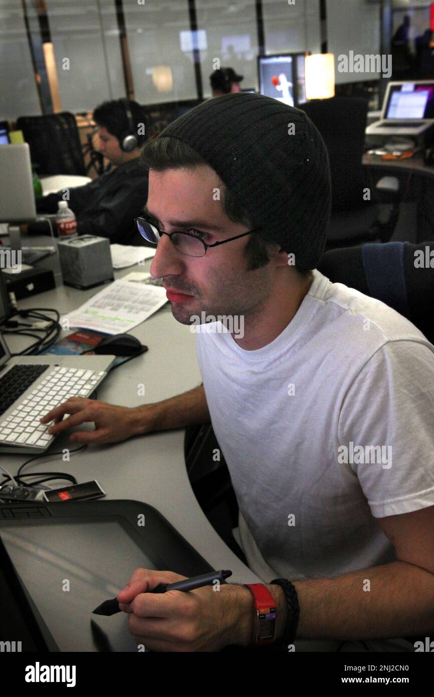 2-D artist Mario-john Pata working at the Mafia Wars office of Zynga in San Francisco ...