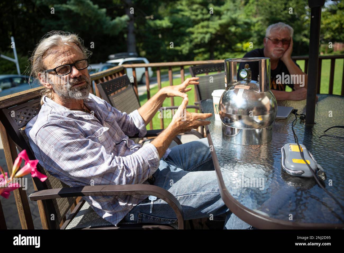 Geomicrobiologist Yuri Gorby and retiree Bob Williamson discuss ...