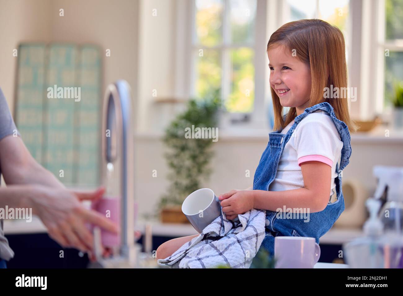 Older person home washing hi-res stock photography and images - Alamy